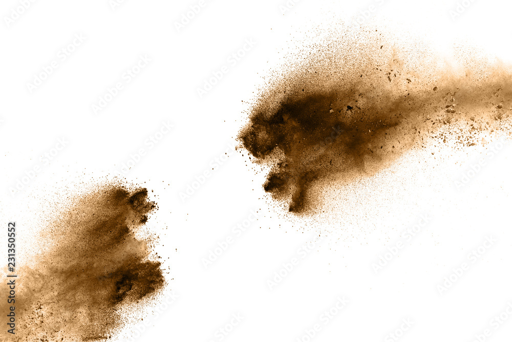 Brown particles splattered on white background. Brown dust splashing ...