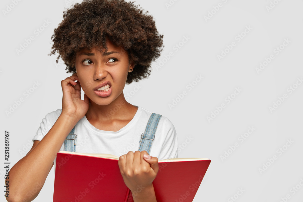 Omg, its so difficult to learn. Displeased emotive dark skinned girl ...