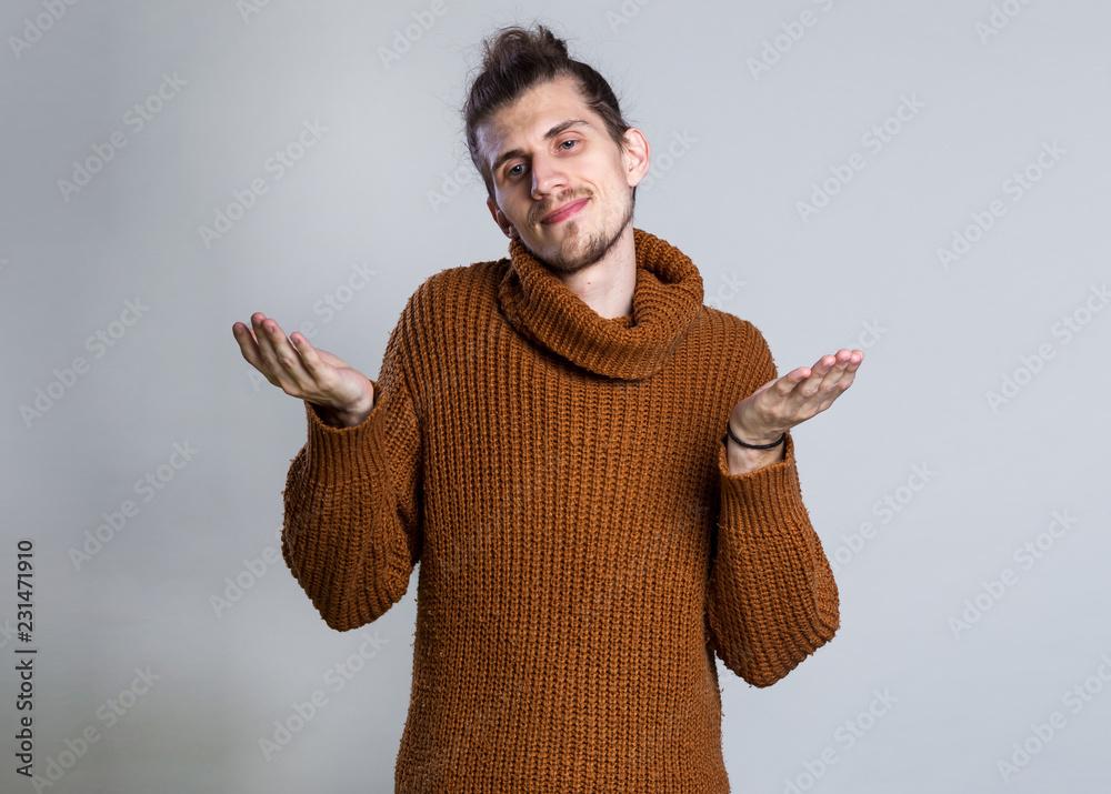 I don't know concept. Portrait of a young man who do not understand ...