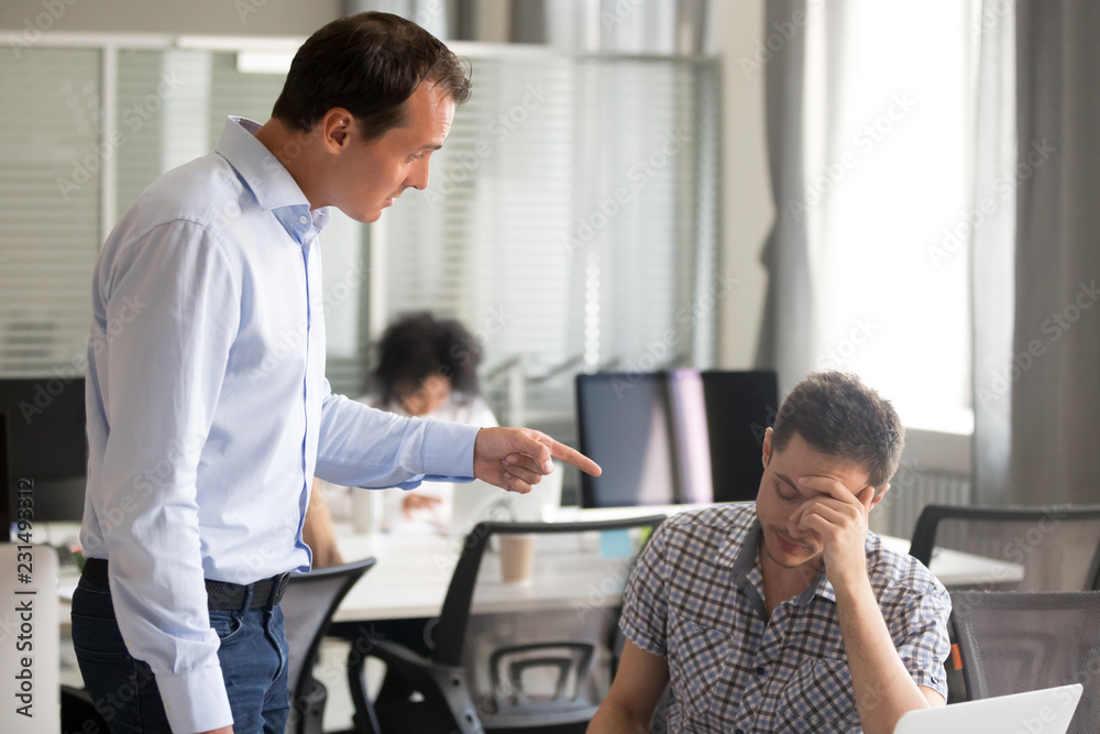 Angry boss ceo scolding rebuking incompetent office worker intern ...