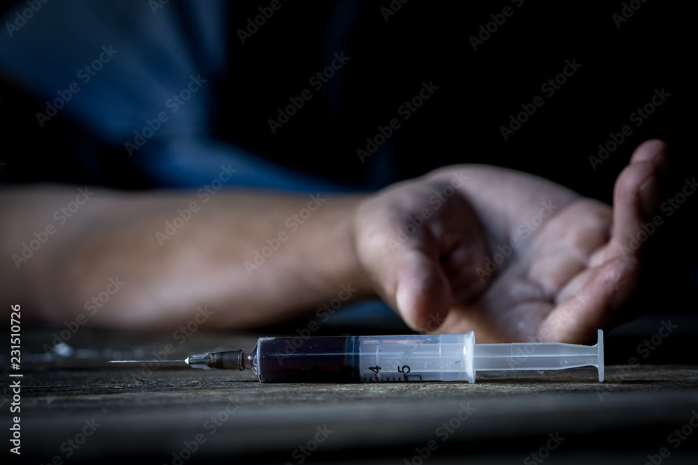 Drug abuse concept, overdose male drug addict hand, drugs narcotic ...