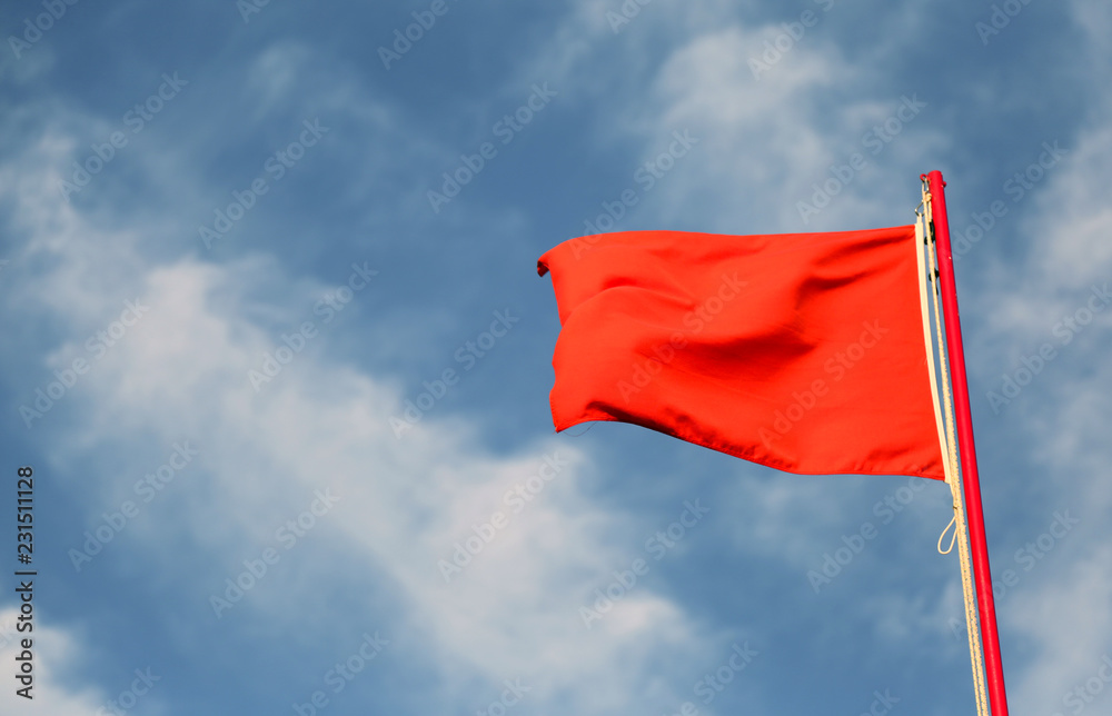 red flag used to indicate the rough sea Stock Photo | Adobe Stock