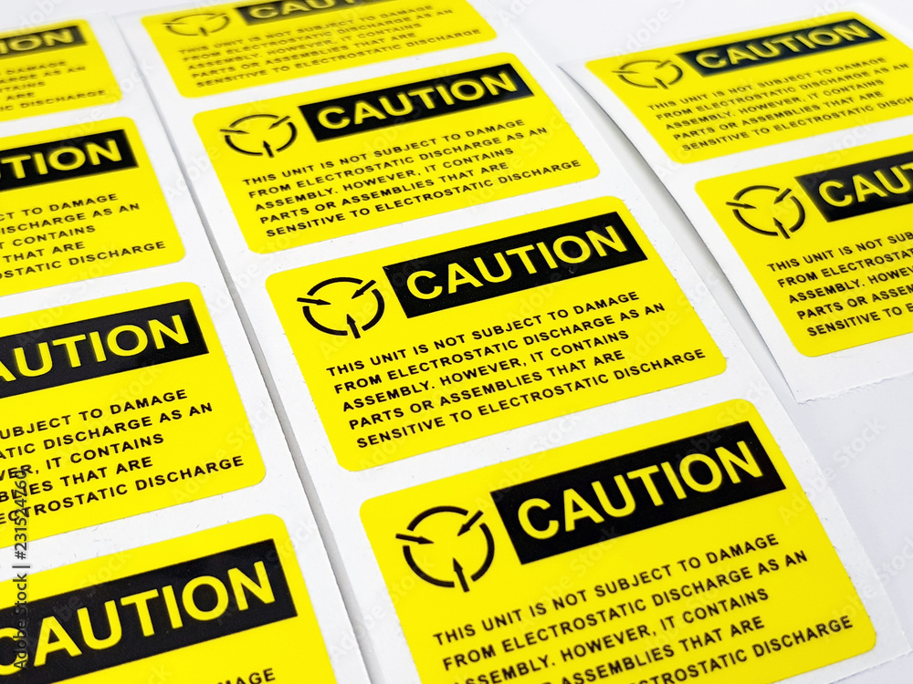 Yellow caution label,Standard caution label with text "Caution" for ...