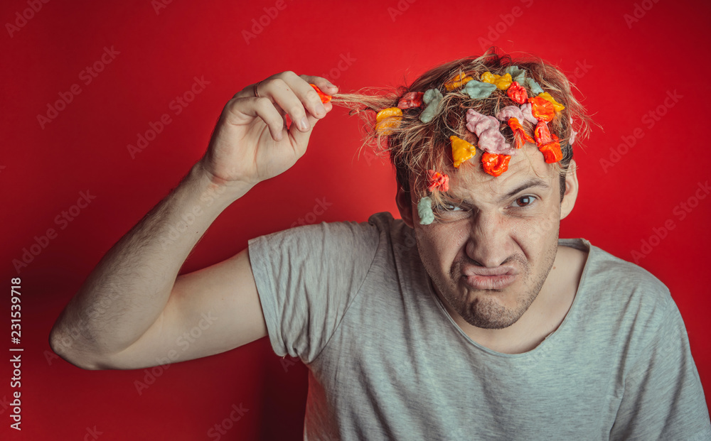 Gum in his head. Portrait of man with chewing gum in his head. Man with ...