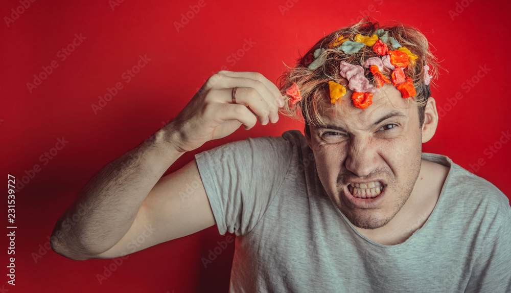 Foto de Gum in his head. Portrait of man with chewing gum in his head ...