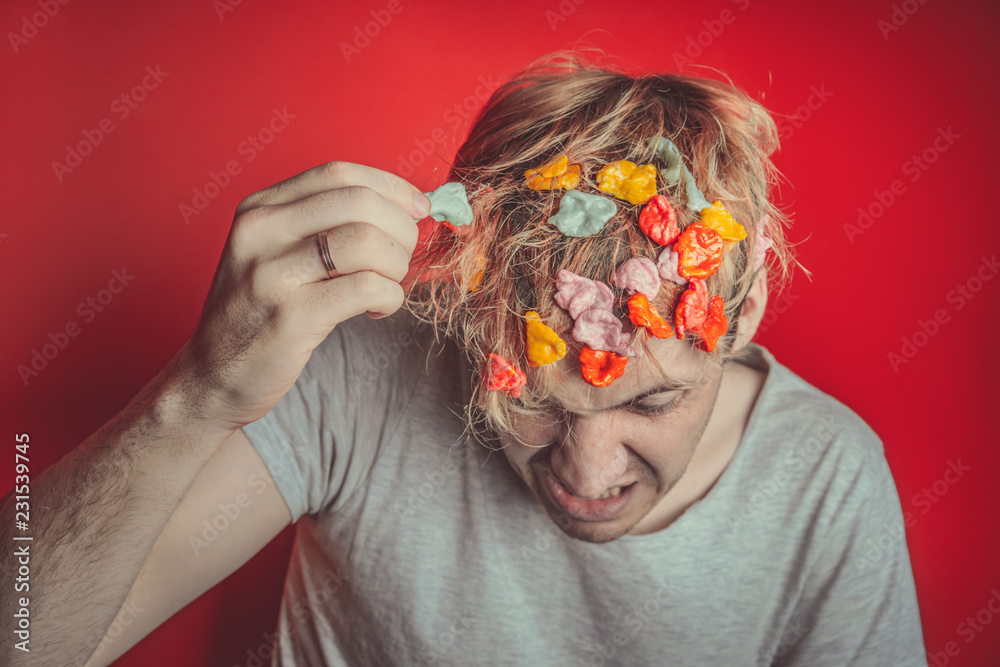 Gum in his head. Portrait of man with chewing gum in his head. Man with ...