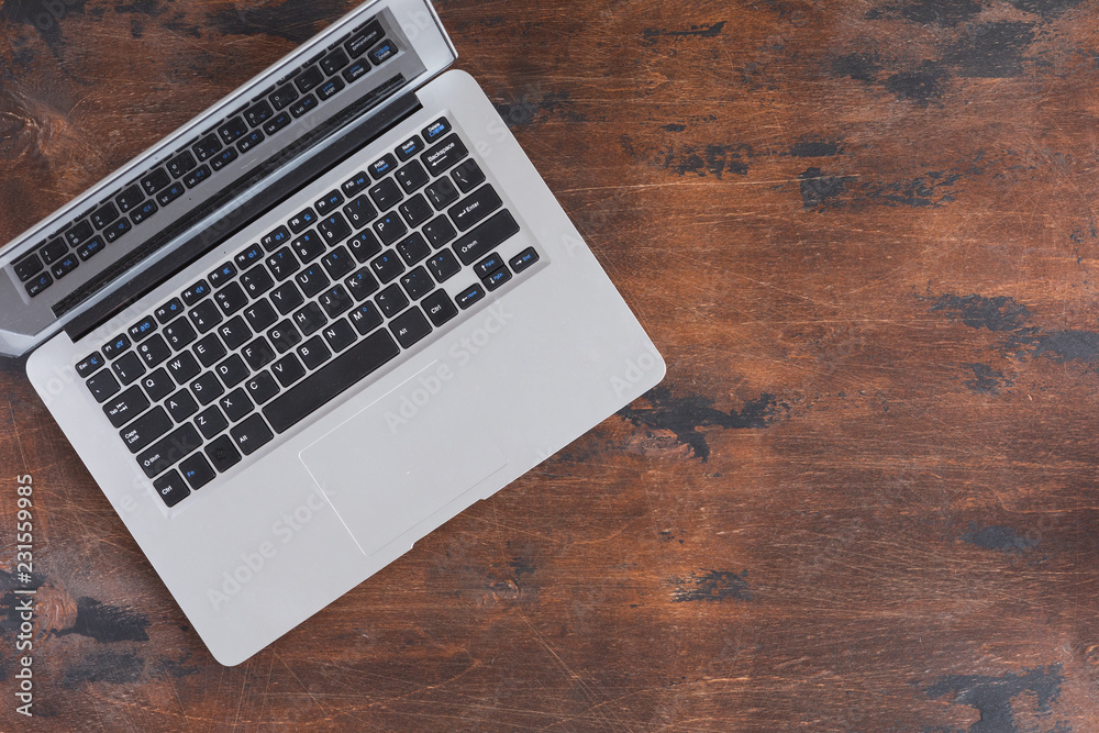 Dark wooden office desk table with laptop computer. Top view and flat ...