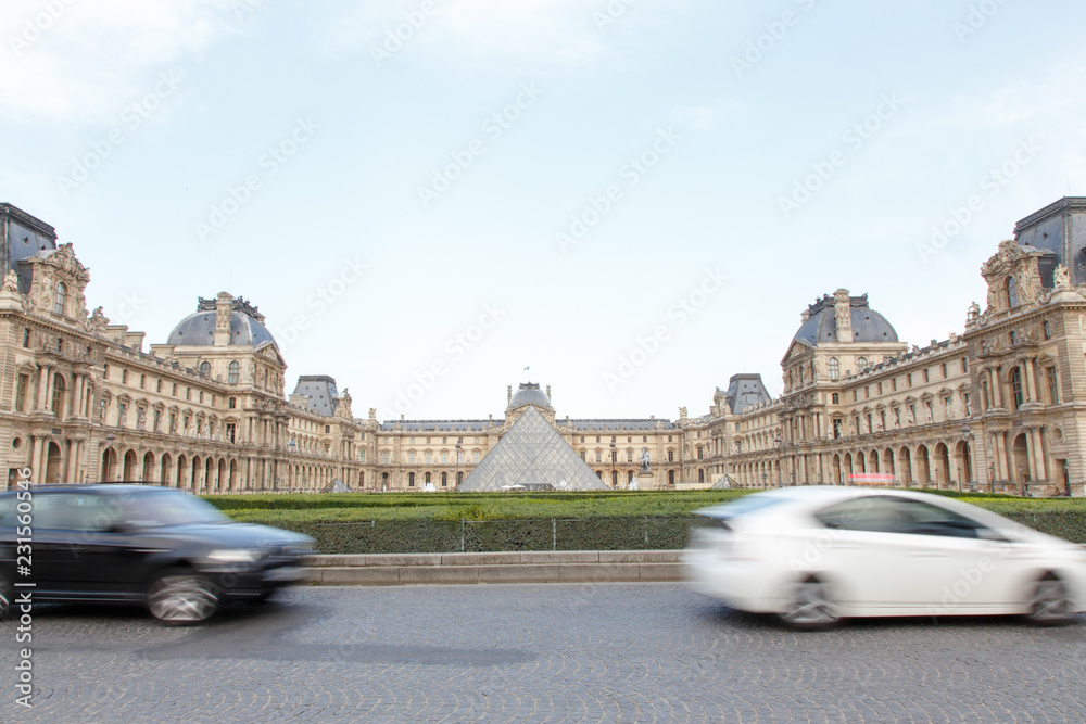 cars driving past the louvre Stock Photo | Adobe Stock