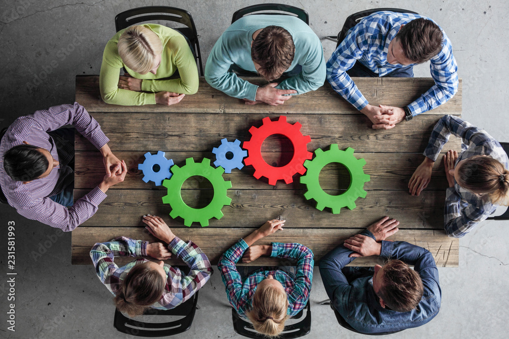 Business people with cogs of business Stock Photo | Adobe Stock