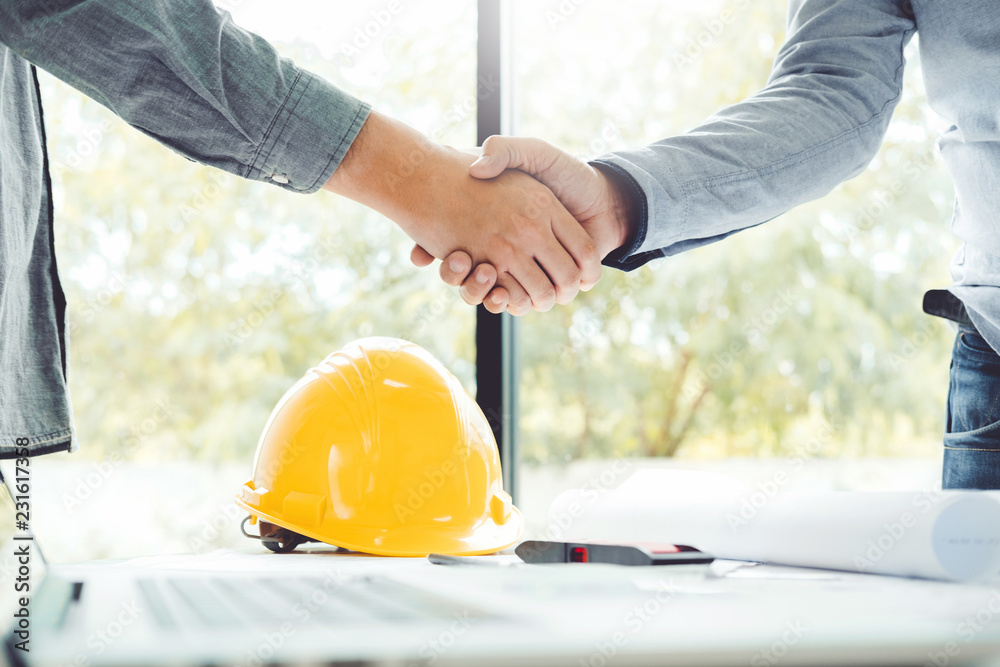 Engineer meeting for architectural project and working with partner ...