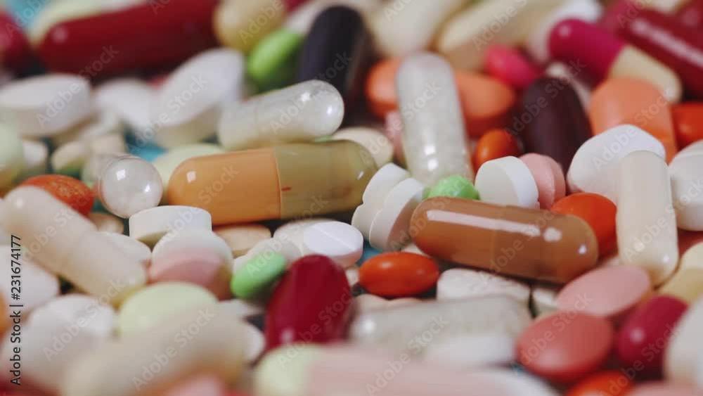 Closeup focusing shot of colorful medication pills Stock Video | Adobe ...