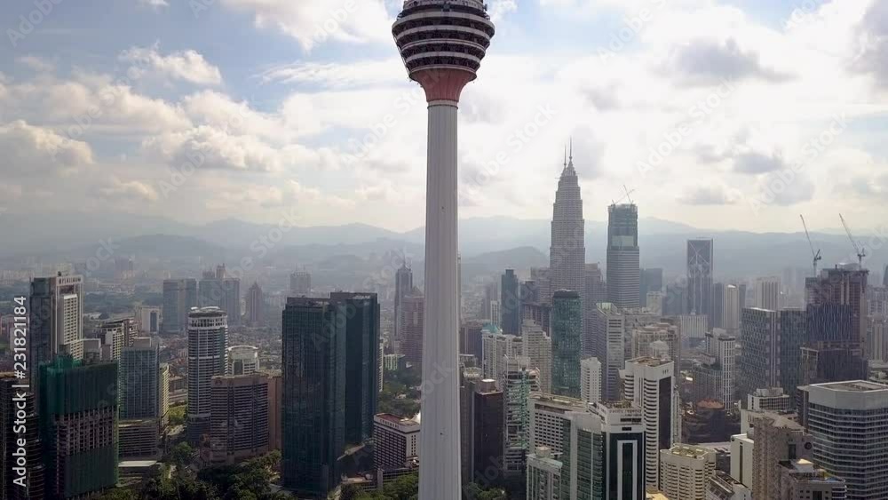 Rising up to reveal the amazingly high Menara Tower in Kuala Lumpur KL ...