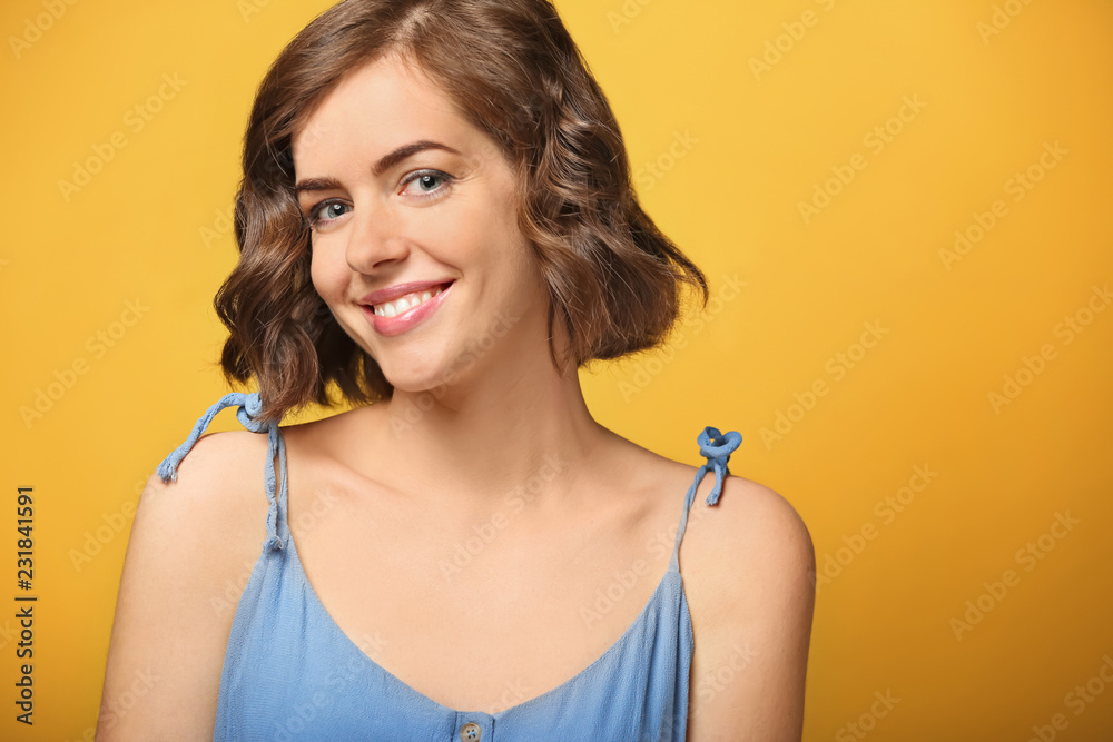 Portrait of beautiful young woman on color background Stock Photo ...