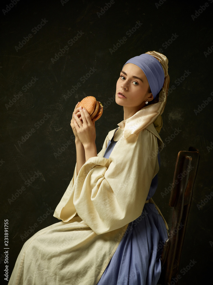 Medieval Woman in Historical Costume Wearing Corset Dress and Bonnet ...