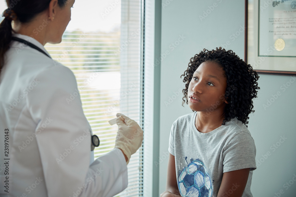 Doctor and patient talking Stock Photo | Adobe Stock