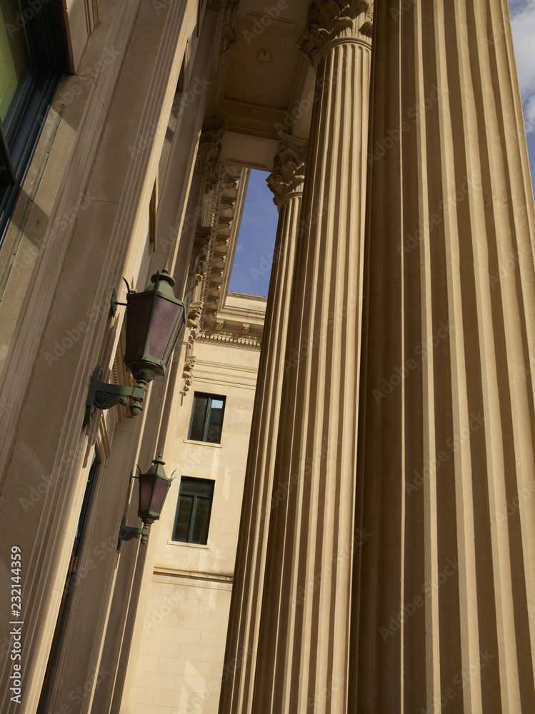 Courthouse pillars and light fixture Stock Photo | Adobe Stock