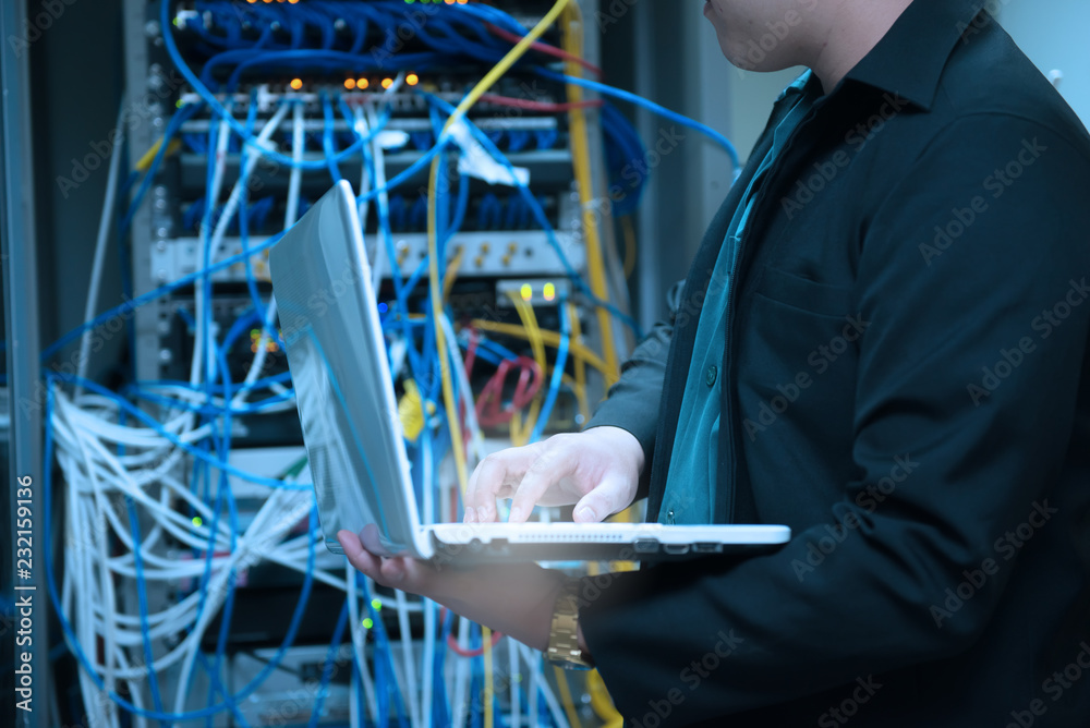 Engineer with toolboxs come to server room for work,check problem of ...