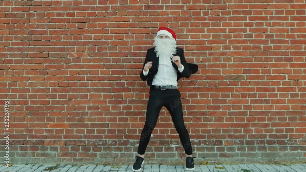man like a Santa Claus is dancing, Merry christmas and New year 2019 ...