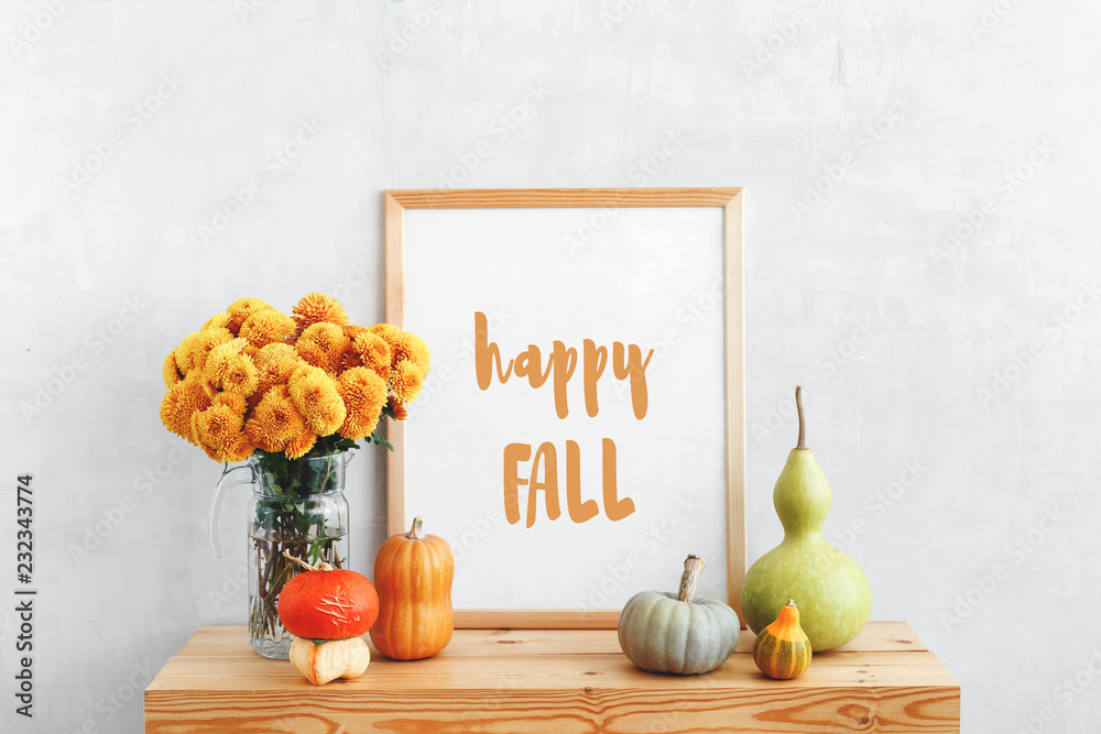 Frame with text HAPPY FALL, decorative pumpkins, lagenaria or bottle ...