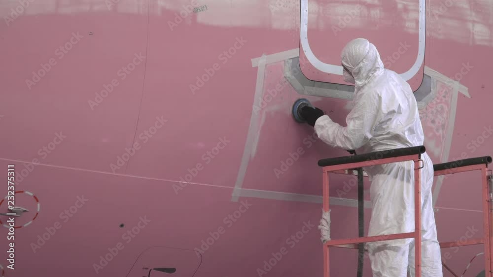 Vídeo do Stock: Painting the aircraft at the factory. The engineer ...