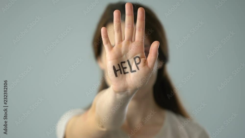 Help word on bruised womans palm, crime victim begging support, issue ...