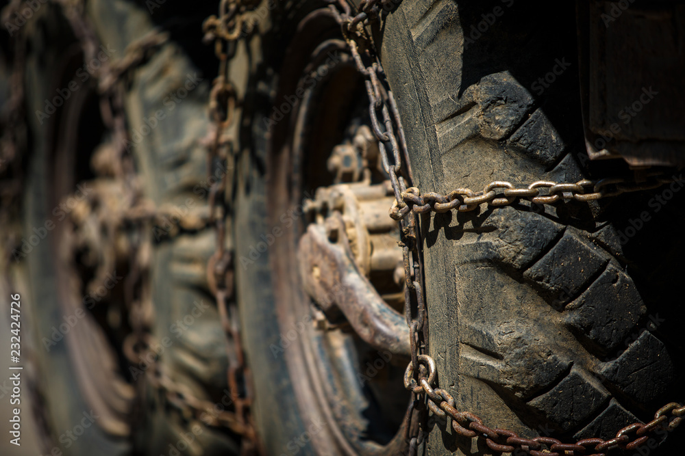 Large wheels of an old ZIL military car with smooth rubber and anti ...