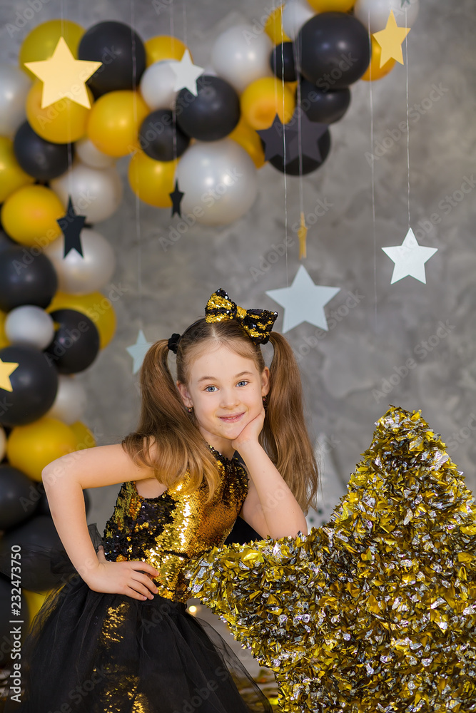 Movie super star girl model posing in studio shoot with golden star and ...