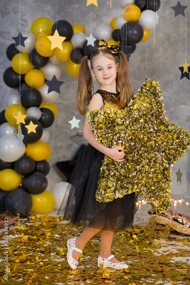 Movie super star girl model posing in studio shoot with golden star and ...