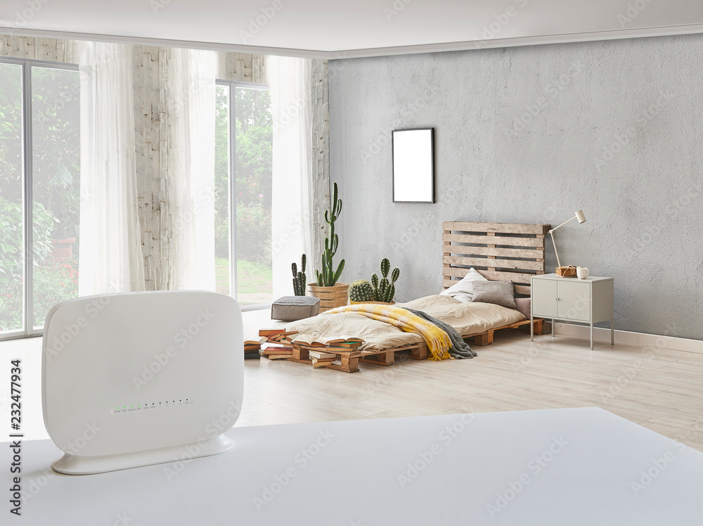 Router and Modem internet box close up and on the white table. Modern ...