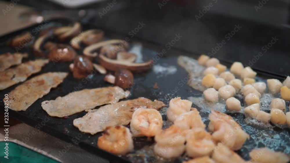 Shrimp, scallops, pork, and mushrooms cooked batayaki style. A variety ...