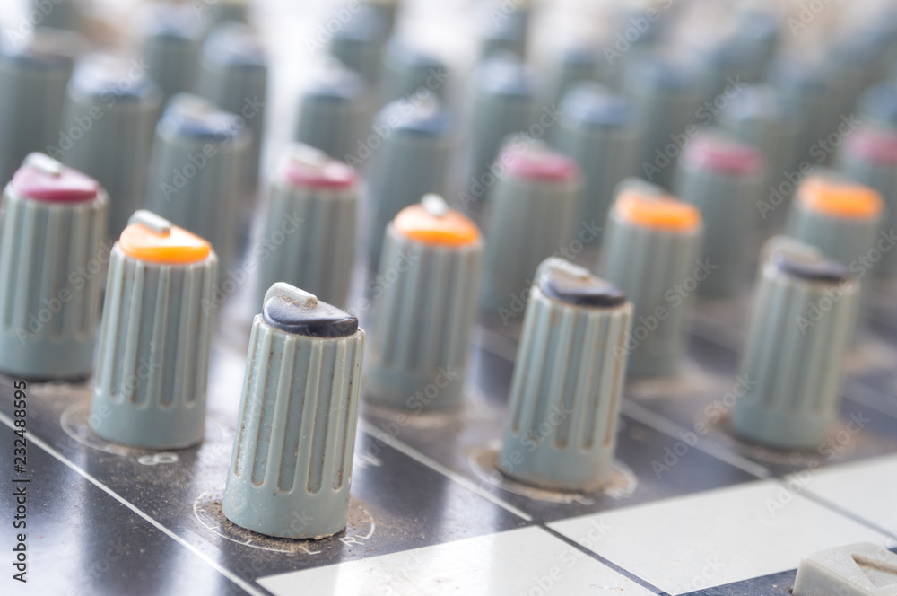 Multi-button rotary switch on the old amplifier Stock Photo | Adobe Stock