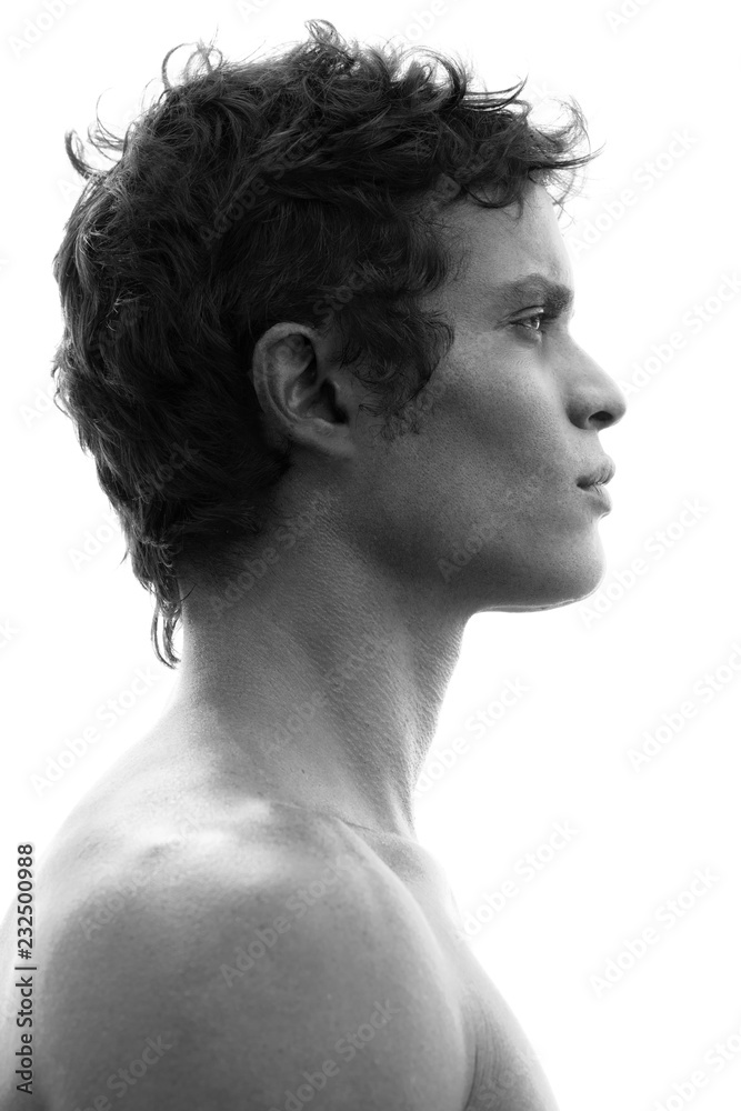 Profile portrait of a fit, bare-chested man with black hair and strong ...