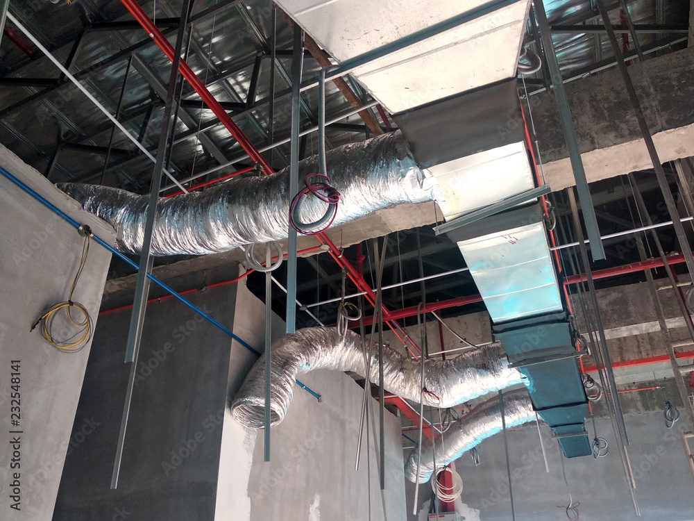 Air-condition and ventilation duct installed by construction workers at ...