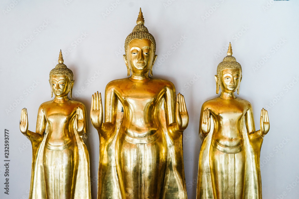 Few golden statues in ancient temple Stock Photo | Adobe Stock