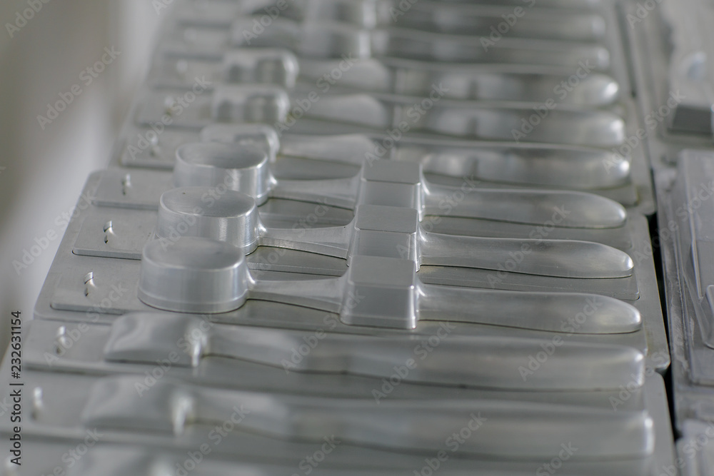 Metal mold for plastic toothbrush mold parts, images with small depth ...