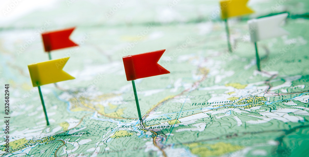 topographic map with colored flag pushpins close up Stock Photo | Adobe ...