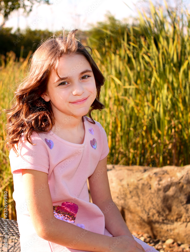 Portrait Of Pretty Smiling Girl 7 8 Years Old With Brown Hair And Big