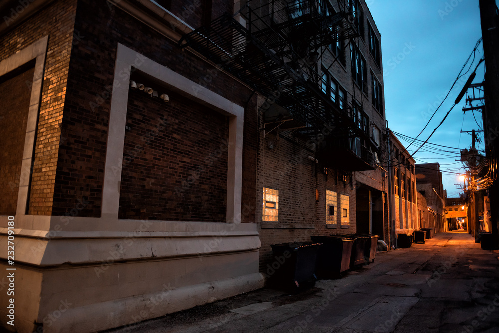 Dark and scary downtown urban city street corner alley with an e Stock ...