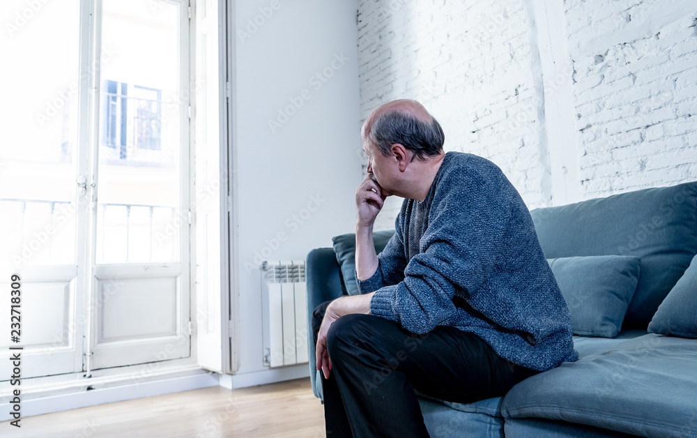 Sad unhappy old senior man suffering from memory loss and alzheimer ...