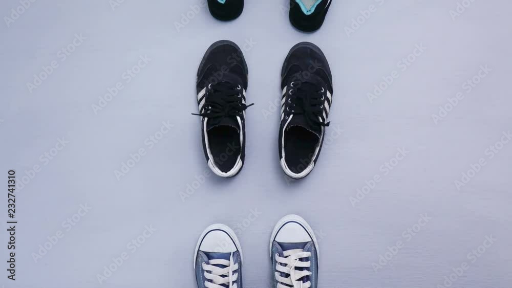 shoes stop motion - close up shoes walking on gray background ...