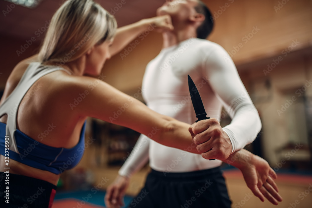 Woman makes punch to the throat, self-defense Stock Photo | Adobe Stock