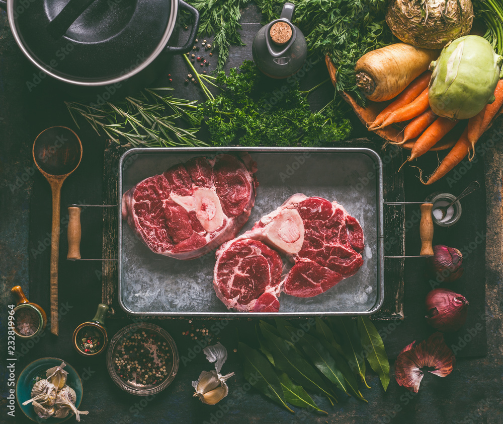Ingredients for tasty Ham Hock Soup : raw beef meat shin with bone ...