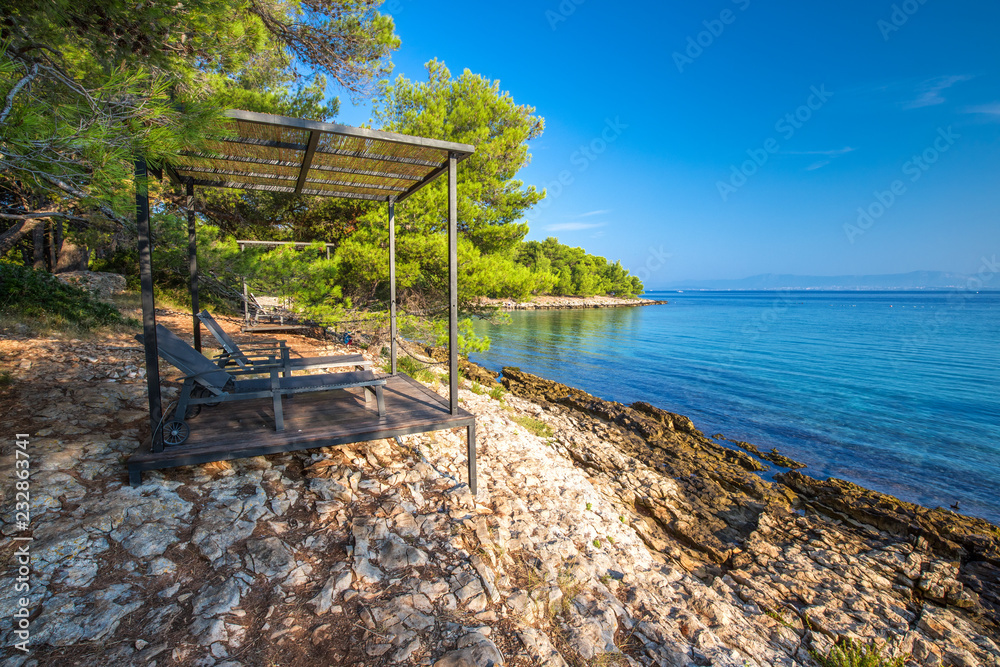 Pebble beach on Brac island with turquoise clear ocean water, Supetar ...
