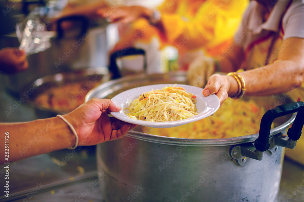 Concept of food sharing for the poor to alleviate hunger Stock Photo ...