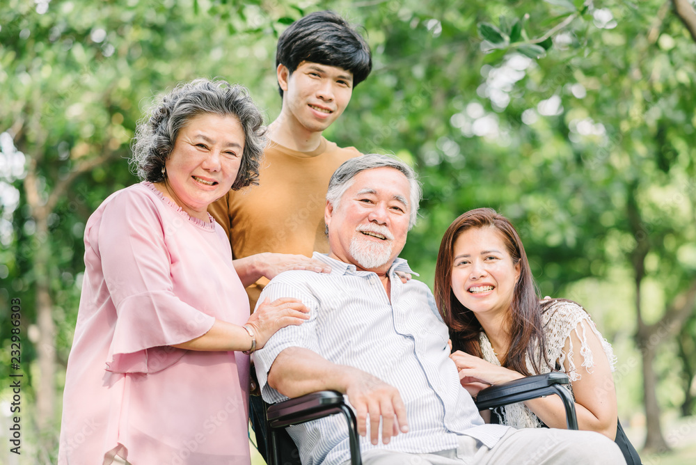 Happy Asian family having a good time Stock Photo | Adobe Stock