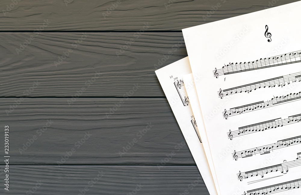 music notes on wooden table Stock Photo | Adobe Stock