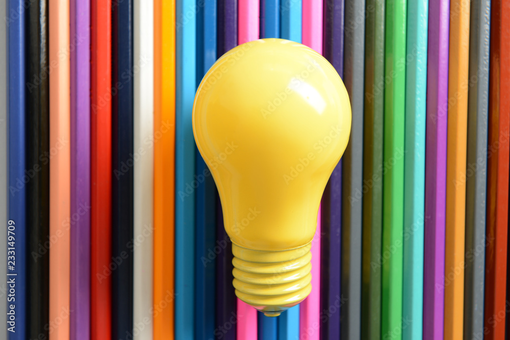 Painted light bulb on colorful background Stock Photo | Adobe Stock