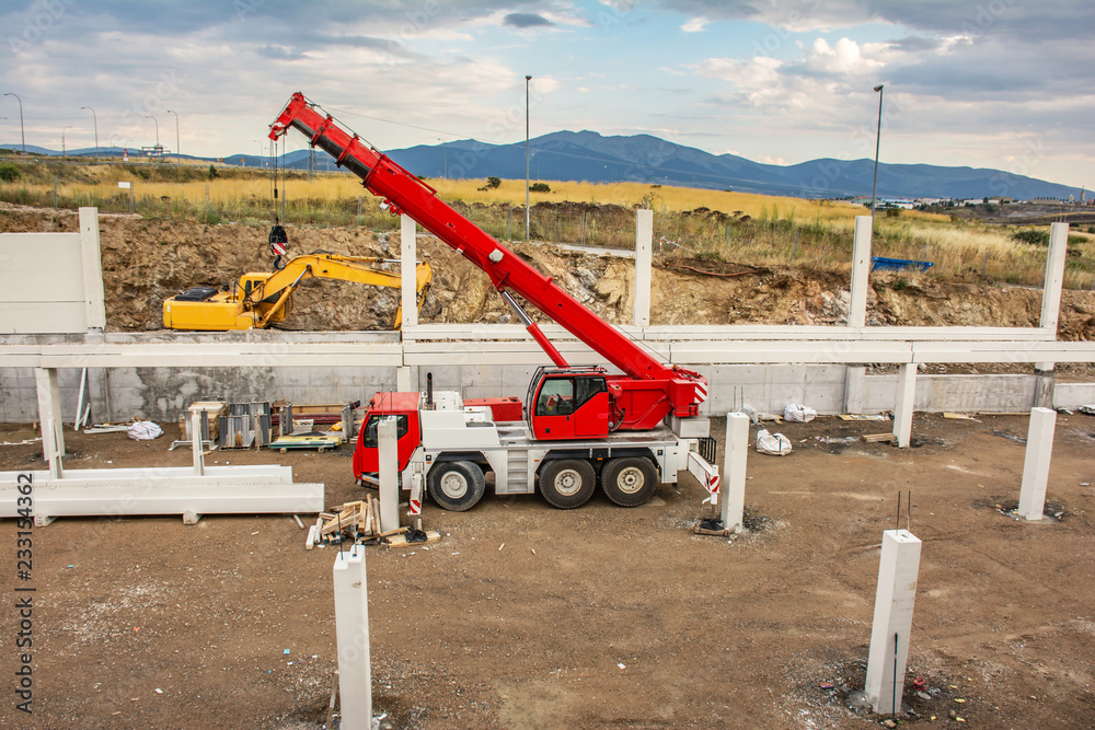 Solar in construction with a mobile crane and machinery Stock Photo ...