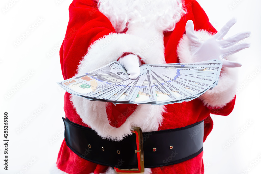 Santa holding US dollar bills isolated on white background Stock Photo ...