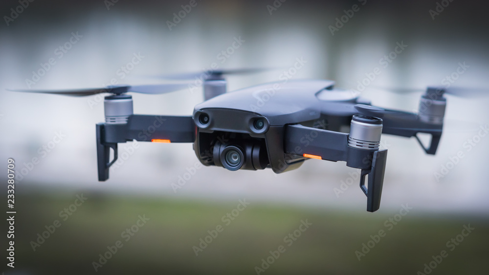 Pancevo - Serbia 02.15.2018. DJI Mavic Air flying mid air on cloudy day ...